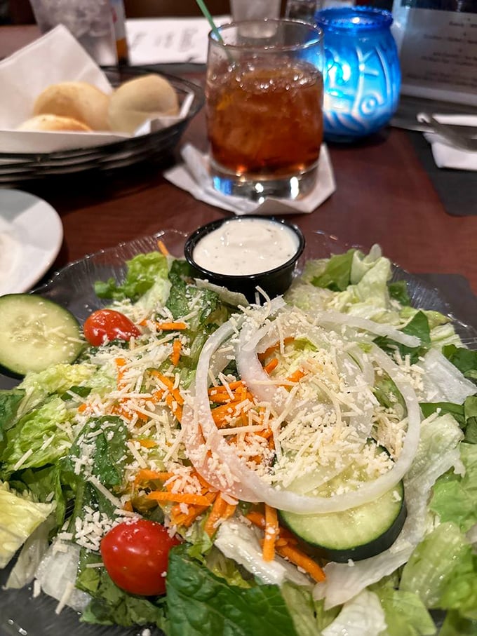 A garden-fresh salad that doesn't apologize for being healthy—it just shows up with enough cheese to remind you you're still in Wisconsin.