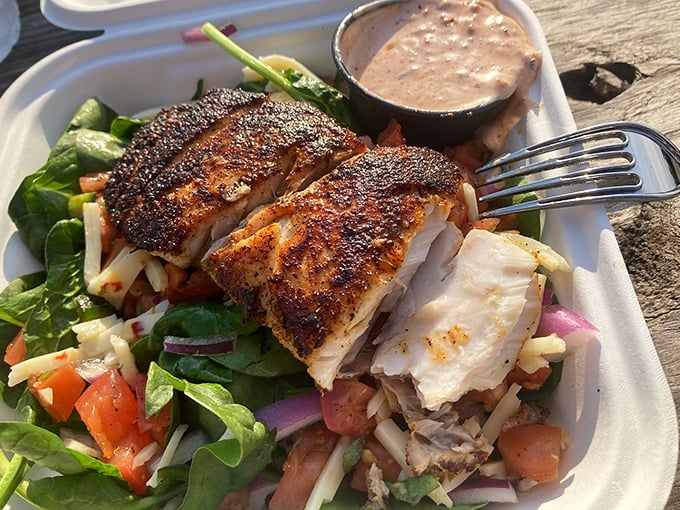 Who said salads can't be exciting? This green foundation topped with blackened fish is the superhero origin story of a truly satisfying meal.