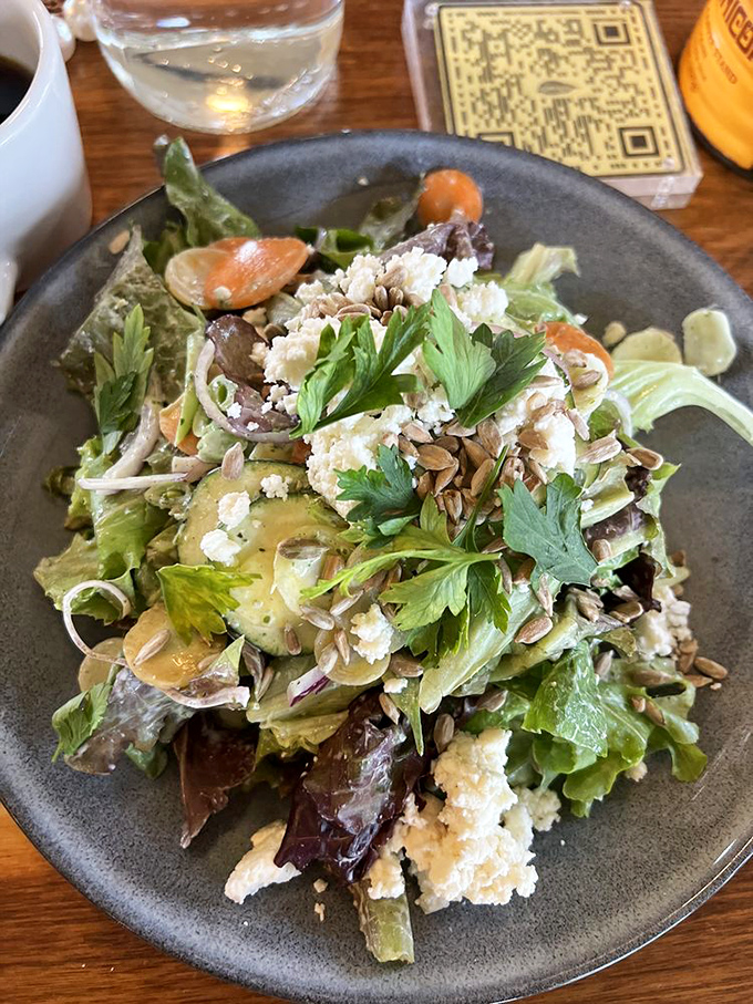 A salad that actually excites&mdash;fresh greens, crumbled cheese, and enough interesting bits to make each forkful a new discovery.