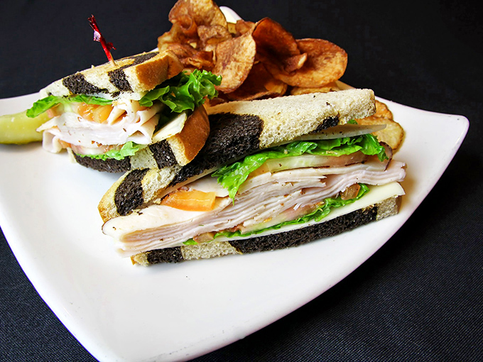 The club sandwich&mdash;boxing's unsung middleweight champion. Layers of flavor stacked higher than a fighter's ambitions, with house-made chips as the perfect cornerman.