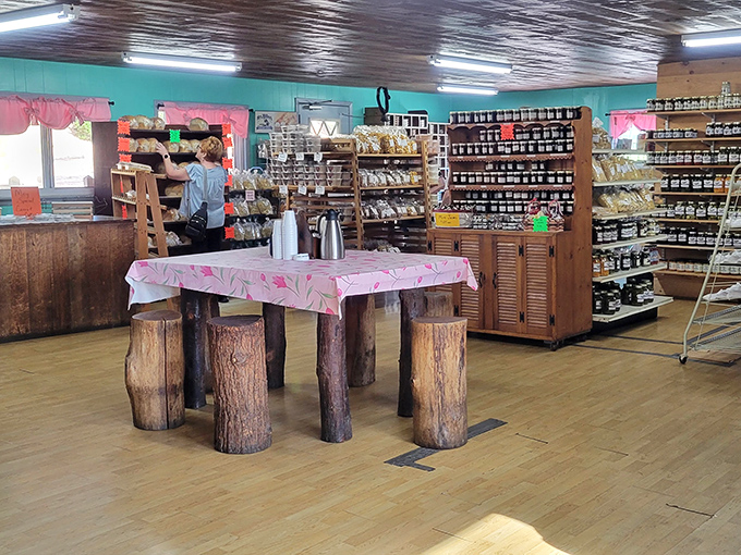 A rustic table with tree trunk legs – because when you're serving food this authentic, plastic furniture would feel like wearing sneakers to a wedding.