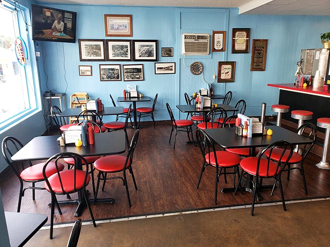 Red chairs waiting for the next round of hungry patrons – a dining room that's seen first dates, business deals, and Sunday post-church gatherings.