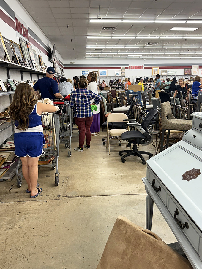 The weekend crowd knows the secret – Thursday mornings are for amateurs, but Saturday shoppers are playing in the thrift store major leagues.