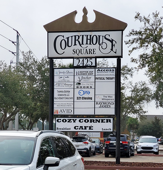 The Court House Square sign stands tall, with Cozy Corner Cafe proudly anchoring a community of local businesses far from the tourist traps.