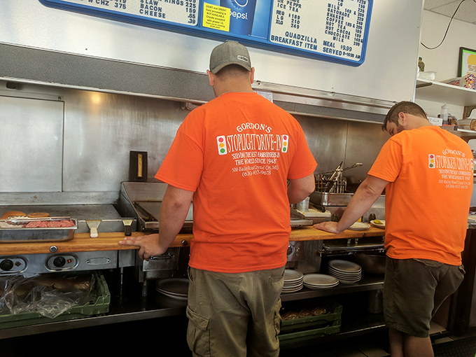 These orange shirts might as well be superhero capes for the crew that's been saving Missouri from hunger one patty at a time.