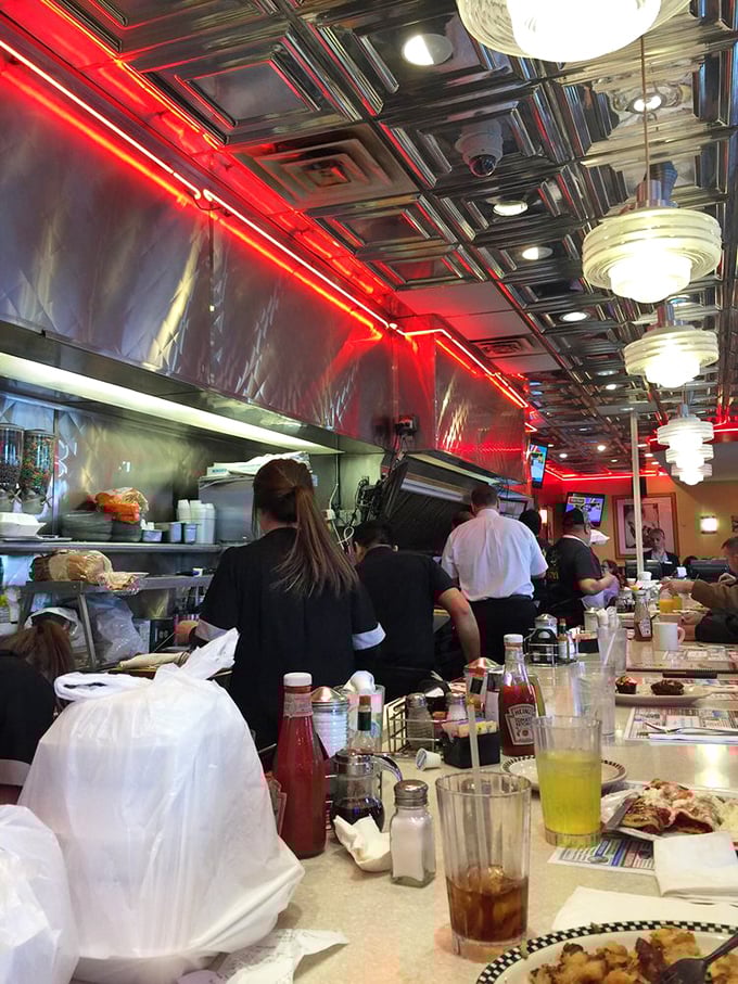 The open kitchen isn't just practical &ndash; it's dinner theater where short-order wizards transform simple ingredients into plates of pure happiness.