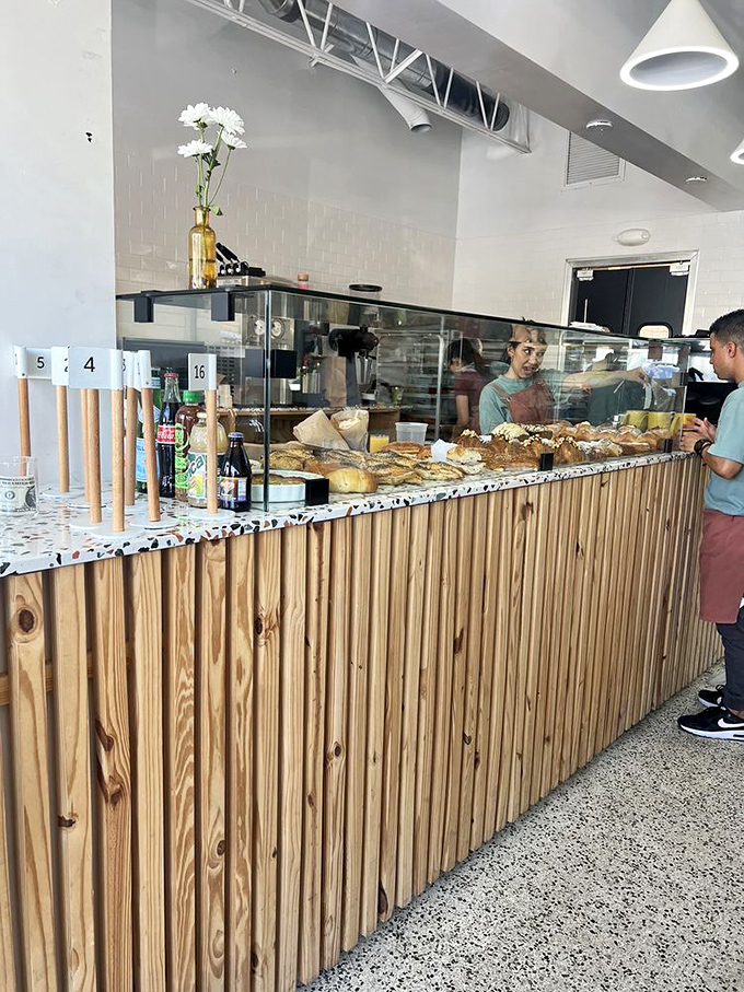 Where the pastry magic happens &ndash; the counter staff at Caracas Bakery serving up Venezuelan delights with the efficiency of people who know they're changing lives.