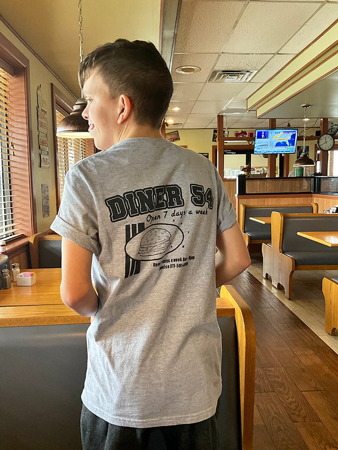 The unofficial uniform of diner dedication. This server's t-shirt says what we're all thinking &ndash; good food, seven days a week.