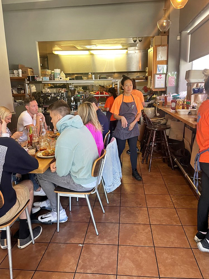 The friendly faces behind the magic, serving smiles alongside exceptional food every single morning.