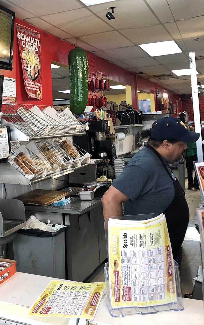 Behind every great deli is a dedicated staff member working their magic. The pickle hanging from the ceiling is their North Star.