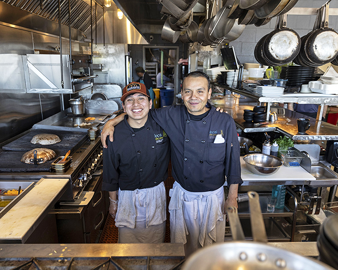The heart and soul behind every perfect plate. These kitchen maestros transform ocean treasures into culinary masterpieces with practiced precision and genuine joy.