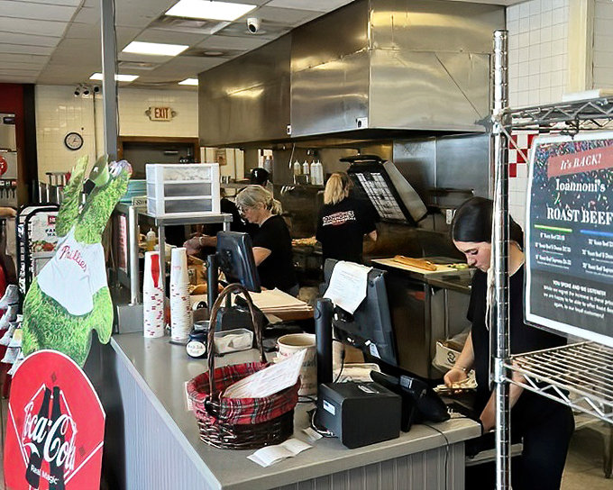 Behind the counter, the staff moves with practiced efficiency, turning orders into edible masterpieces with remarkable speed.