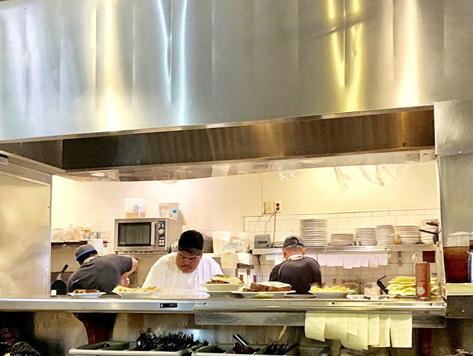 The kitchen pass reveals the wizards behind the breakfast curtain, turning simple ingredients into the stuff of morning legends.