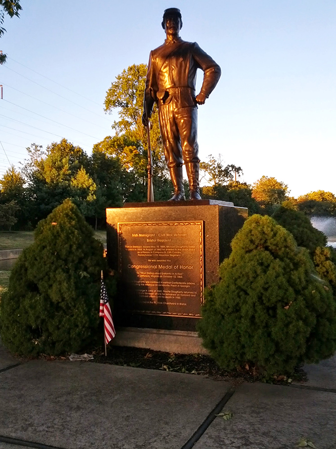 History stands tall in bronze tribute. A silent sentinel who's seen more selfies than battles in recent years.