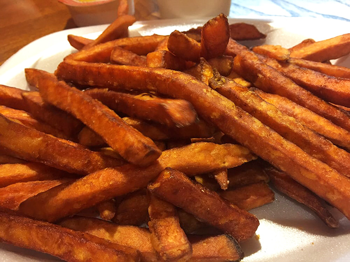 Sweet potato fries with the perfect crisp-to-soft ratio&mdash;like tiny orange planks of happiness that make regular fries question their life choices.
