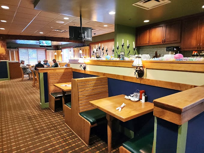 Cozy booths and warm lighting create the perfect setting for everything from family breakfasts to solo dining adventures.