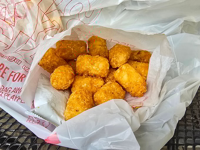 Golden nuggets of potato perfection. These tater tots aren't just a side dish—they're little crispy bites of nostalgia that transport you straight back to childhood.