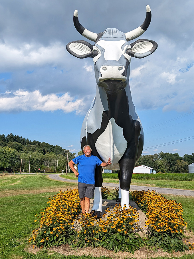 "We've bonded." The ultimate tourist-meets-attraction moment that perfectly captures why we can't resist these wonderfully weird roadside encounters.