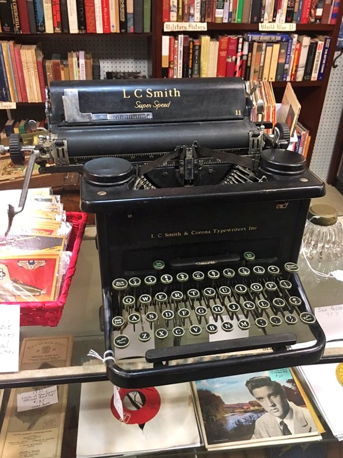 An L.C. Smith typewriter sits ready for the next great American novel, its keys holding the ghosts of letters, invoices, and love notes past.