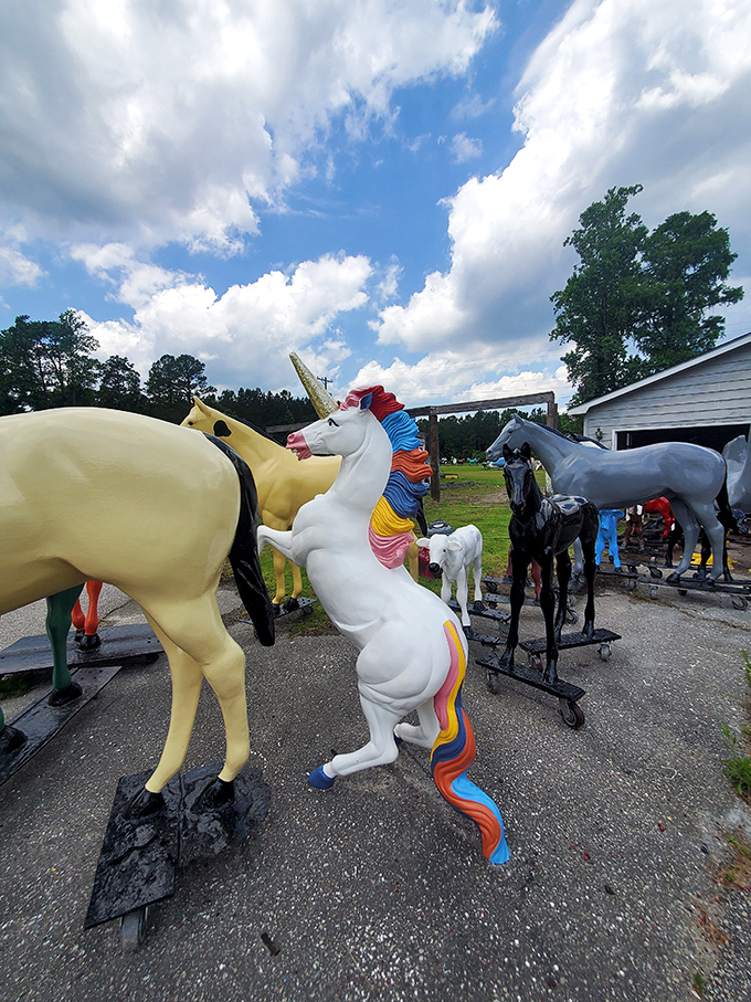 Fantasy meets fiberglass as this rainbow-maned unicorn rears up dramatically. Somewhere, a Lisa Frank folder from 1992 is missing its mascot.