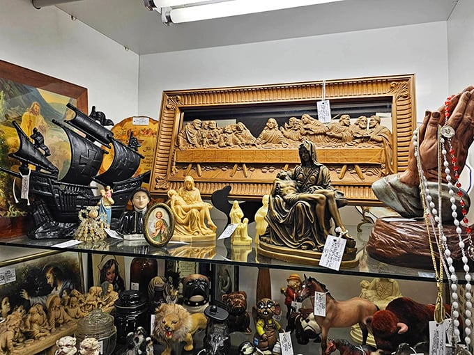 Religious artifacts and art sharing shelf space in perfect harmony. That Last Supper carving has seen more Sunday dinners than most.