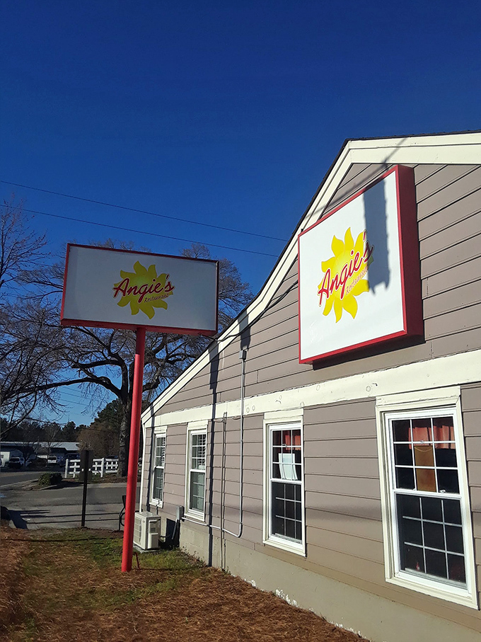That sunshine-yellow logo stands out against Carolina blue skies, promising a brightness that extends well beyond the building's exterior.