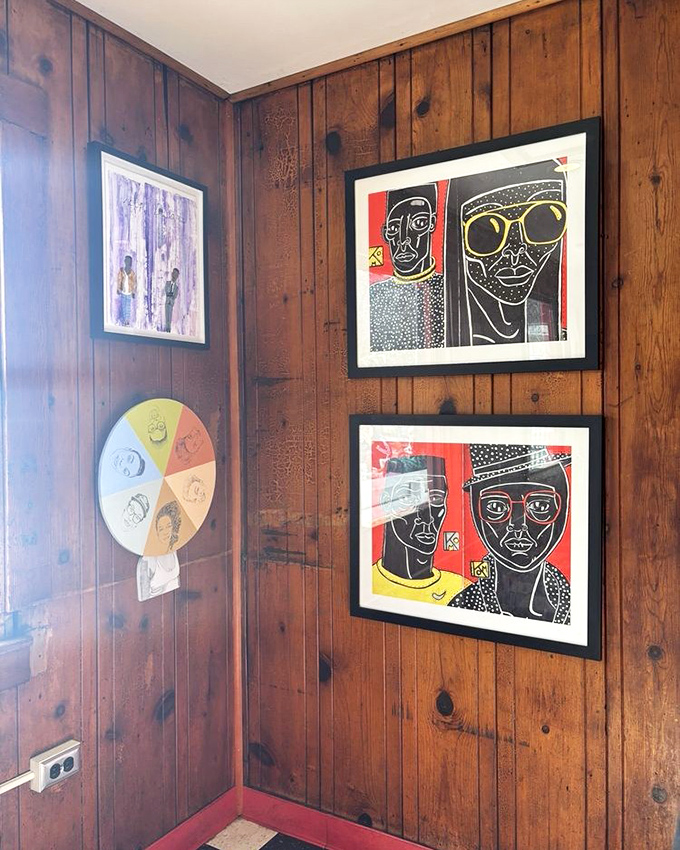 Art that adds character to wood-paneled walls. Jim Denny's isn't just feeding stomachs; it's nourishing the soul with creativity on every surface.