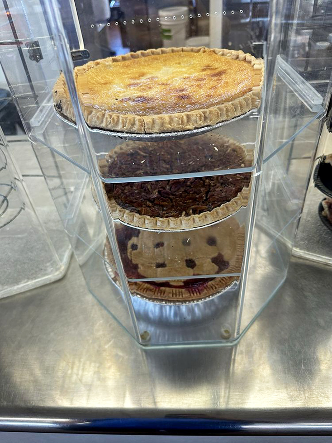 The pie display case&mdash;a glass temple of temptation that makes choosing just one slice mathematically impossible.