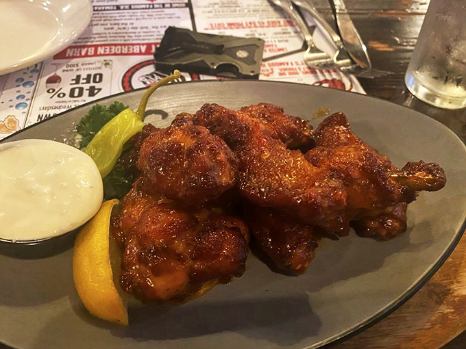 Wings glazed to perfection, proving that sometimes the best things in life come with napkins and zero apologies necessary.