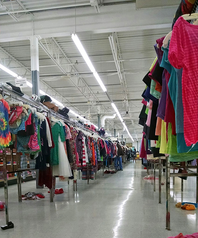 The women's clothing section stretches endlessly with vibrant colors and patterns. Fashion trends may come and go, but thrift store magic is eternal.