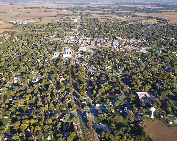 From above, Pana reveals itself as a verdant oasis, where tree-lined streets create neighborhoods perfect for peaceful retirement living.