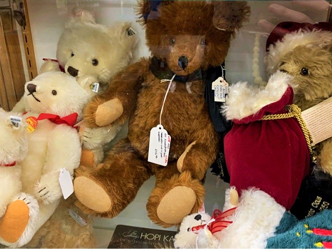 Teddy bears with the wisdom of decades in their glass eyes. Each one looking for their next child to comfort.