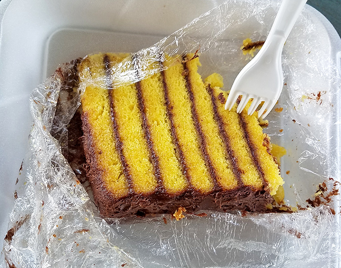 Layer upon layer of moist yellow cake with chocolate frosting&mdash;because after a barbecue feast, your sweet tooth deserves equal attention.