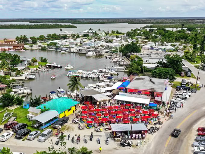Sunday Funday in full swing&mdash;a sea of red umbrellas marks the spot where memories are made and Monday responsibilities forgotten.