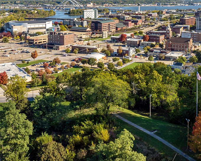 From above, Moline reveals its perfect positioning along the mighty Mississippi, with autumn colors painting the landscape in nature's finest palette.