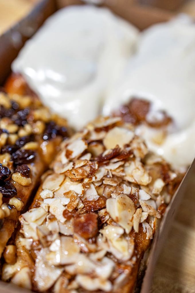 The almond roll&mdash;nature's perfect partnership. Toasted almonds add textural contrast and nutty depth to the pillowy sweetness beneath.