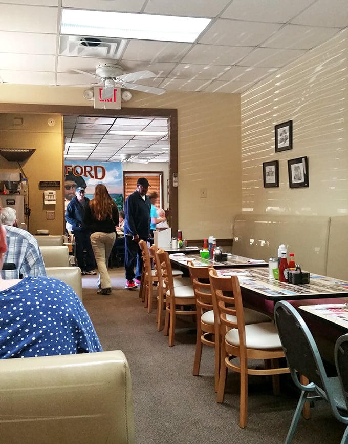 Another dining room angle reveals the simple, no-nonsense approach that keeps regulars coming back. No designer lighting fixtures&mdash;just consistently good food in a comfortable setting.