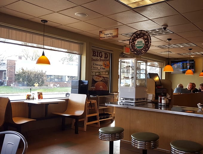 Morning light streams through large windows, illuminating a space where "Thank You, Please Come Again!" isn't just a sign but a heartfelt invitation.