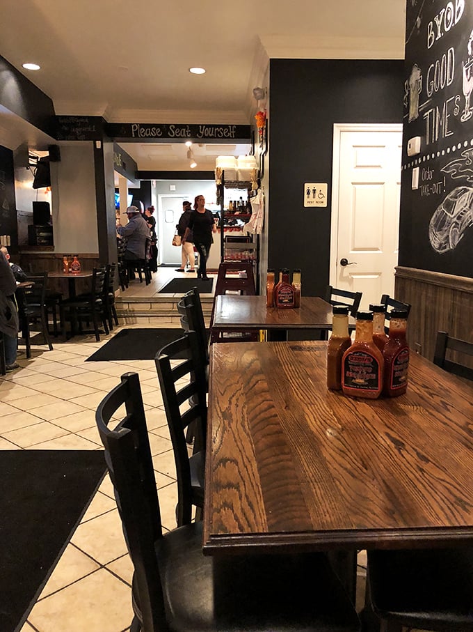 The spacious interior accommodates everyone from solo diners to large groups celebrating great barbecue together.