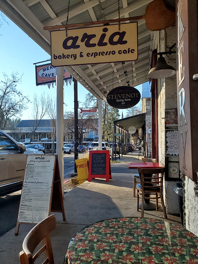 Aria Bakery's sidewalk seating invites you to linger over espresso and pastries while watching the gentle parade of Main Street life.