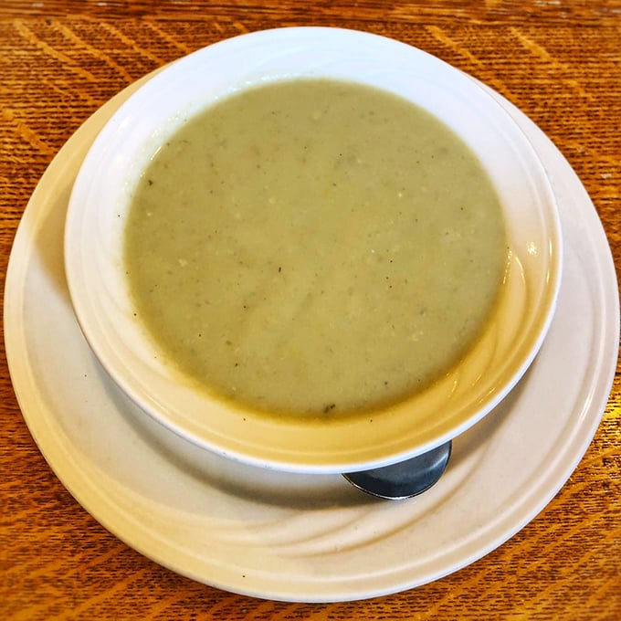The legendary artichoke soup&mdash;a pale green promise of creamy, earthy flavors that captures the essence of coastal California in every spoonful.