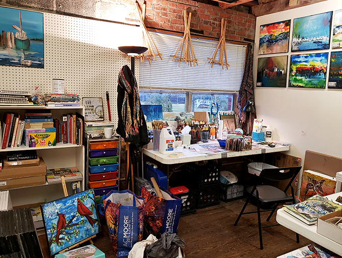 An artist's corner where creativity flows as freely as the paint&mdash;brushes stand ready for their next masterpiece amid colorful inspiration.