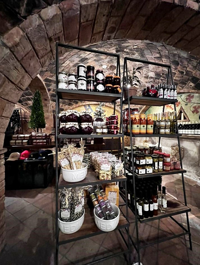 The castle's shop displays Italian delicacies and wine accessories in a stone-walled chamber that makes even a bottle opener feel like a medieval treasure.