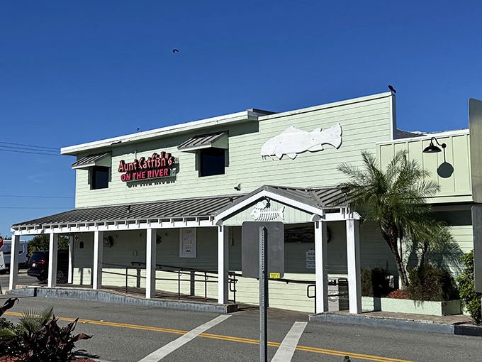 Aunt Catfish's mint-green exterior stands as a beacon for seafood lovers, like a delicious lighthouse guiding hungry sailors to shore.