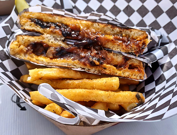 BBQ pulled pork grilled cheese that makes you question your seafood order&mdash;until you remember you can always come back tomorrow.