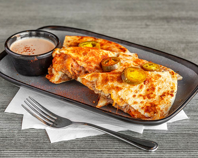 BBQ quesadillas&mdash;where Memphis meets Mexico in a glorious fusion. Those jalape&ntilde;os aren't just garnish; they're exclamation points in this cross-cultural conversation.