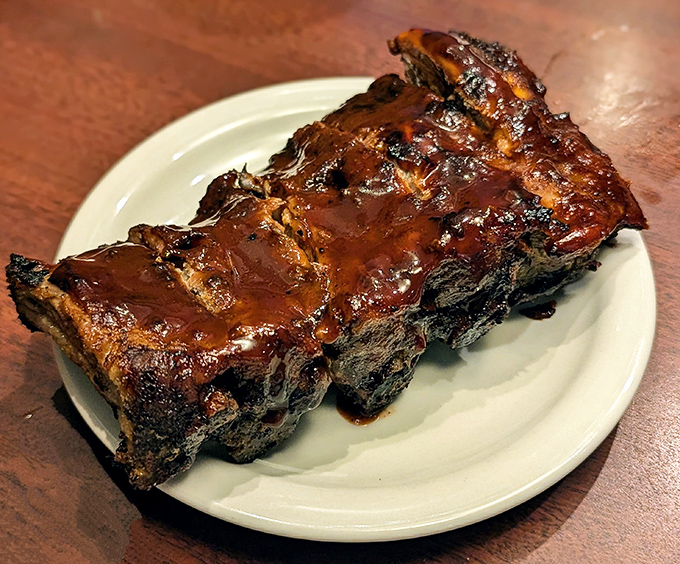 These ribs glisten with sauce like they're ready for their close-up on food TV.