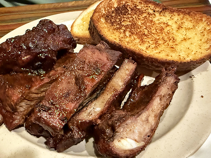 St. Louis ribs with that perfect pink smoke ring and a side of Texas toast. Not just food &ndash; it's edible architecture built on generations of know-how.