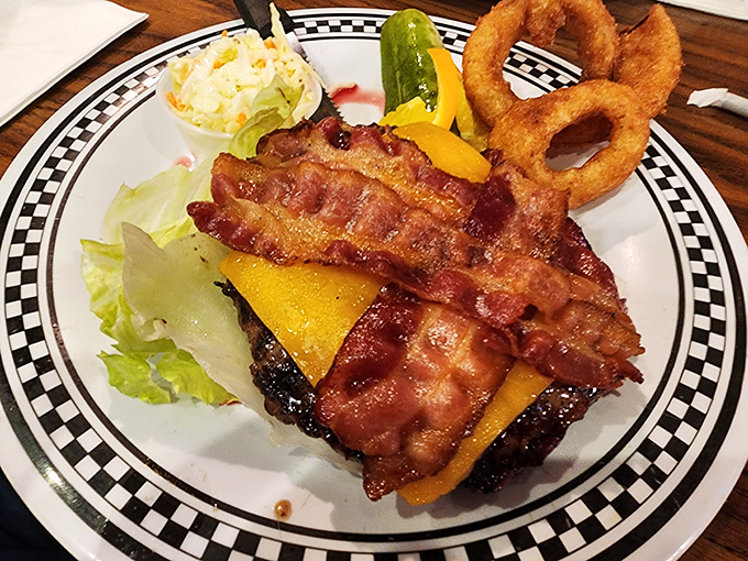 A burger that doesn't just satisfy hunger&mdash;it conquers it with crispy bacon reinforcements and melty cheese artillery.