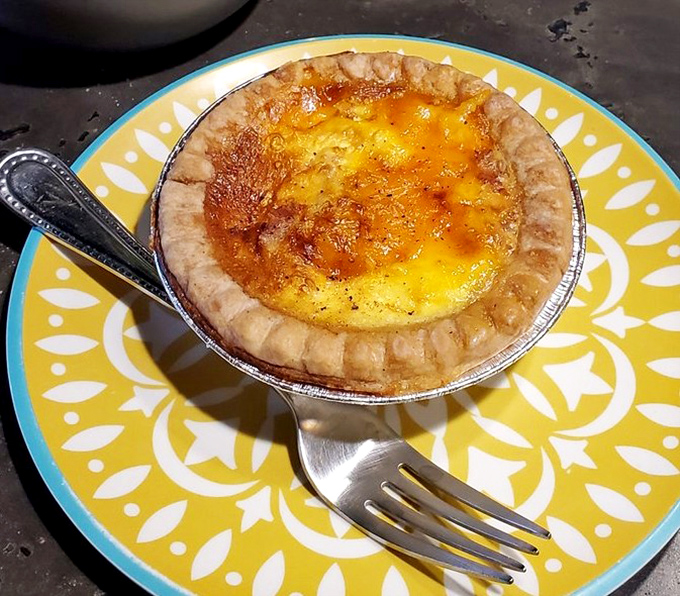 A quiche that would make a French chef nod approvingly. The golden, bubbling surface promises creamy perfection beneath that flaky crust.